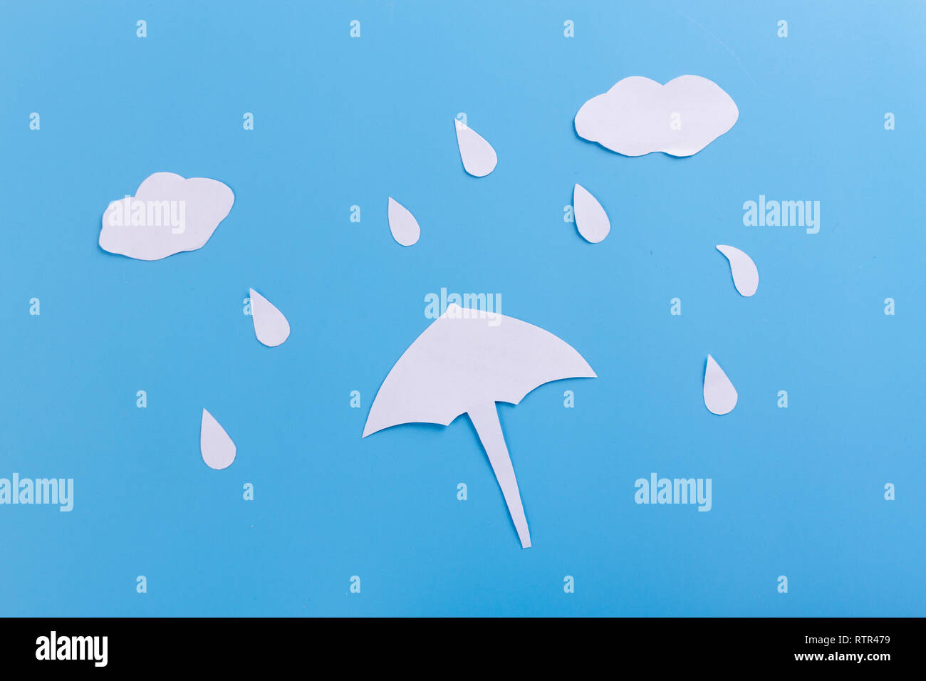Rain drops falling onto umbella. paper cut Stock Photo - Alamy