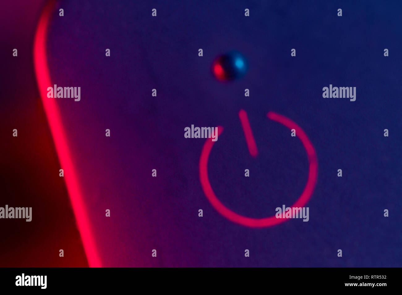 remote red button to turn on. close up Stock Photo - Alamy