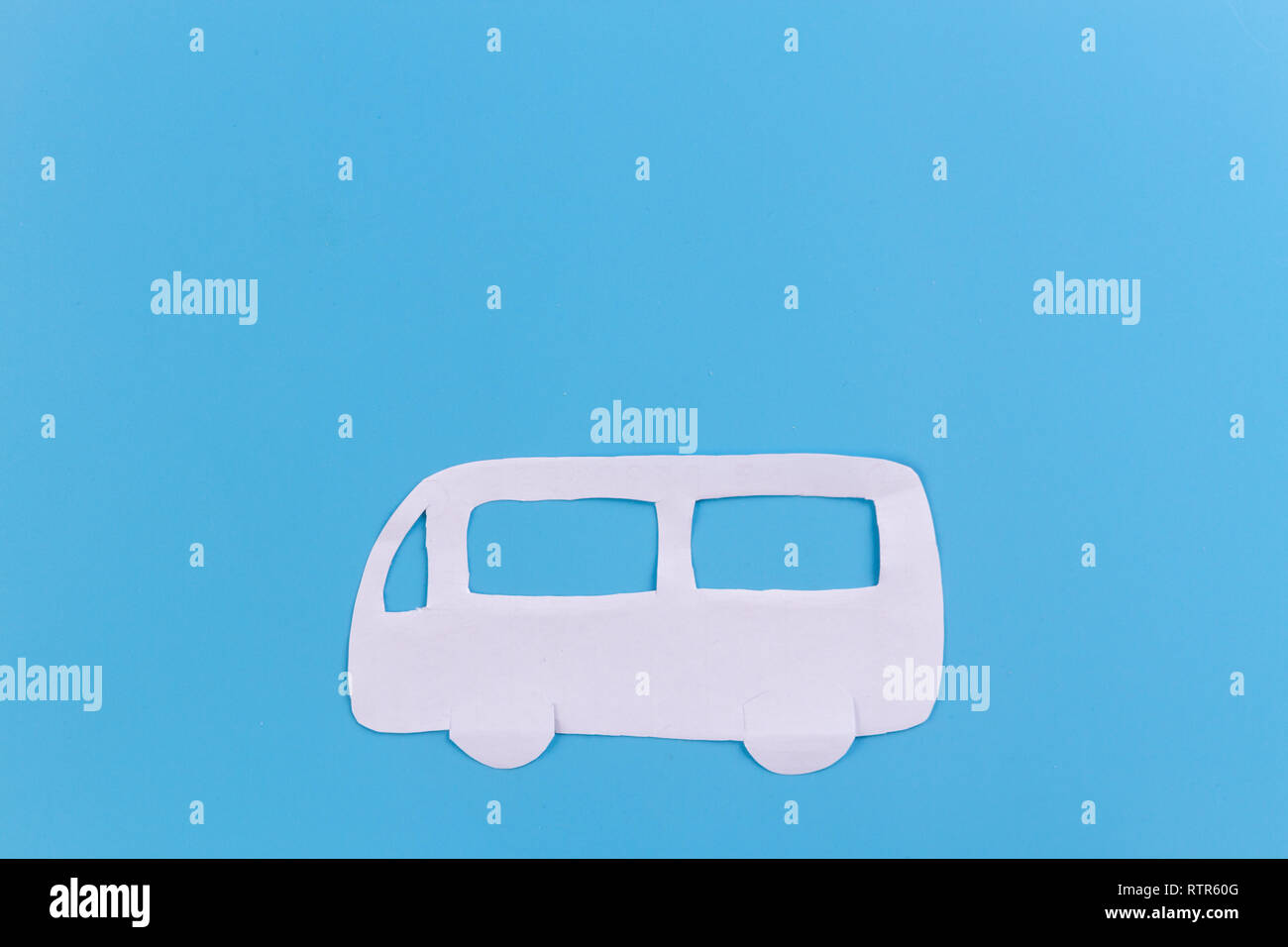 school bus on blue background. paper cut Stock Photo - Alamy