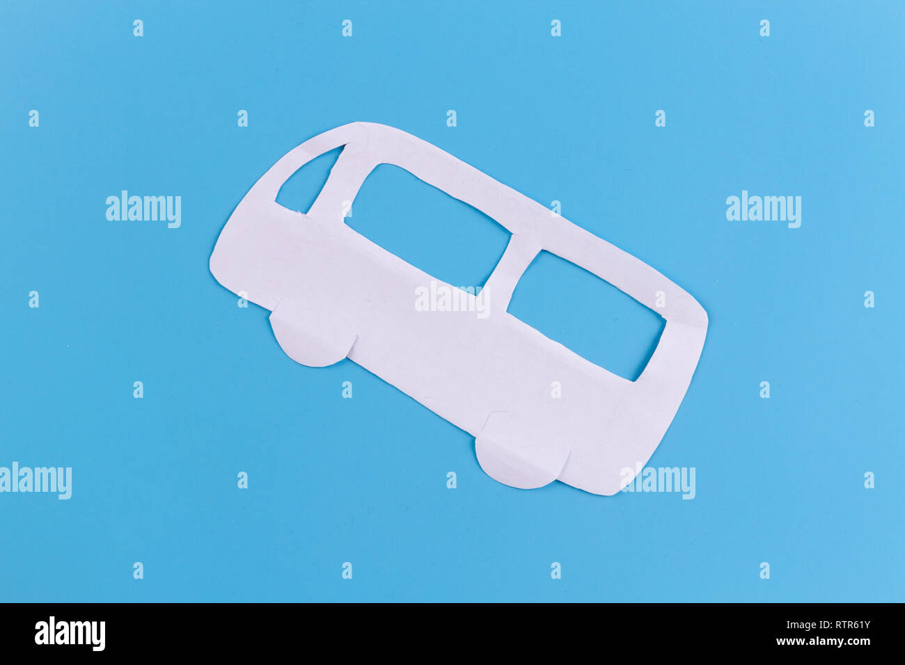school bus on blue background. paper cut Stock Photo - Alamy
