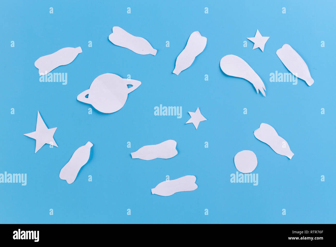 plastic pollution in cosmos concept. paper cut Stock Photo - Alamy