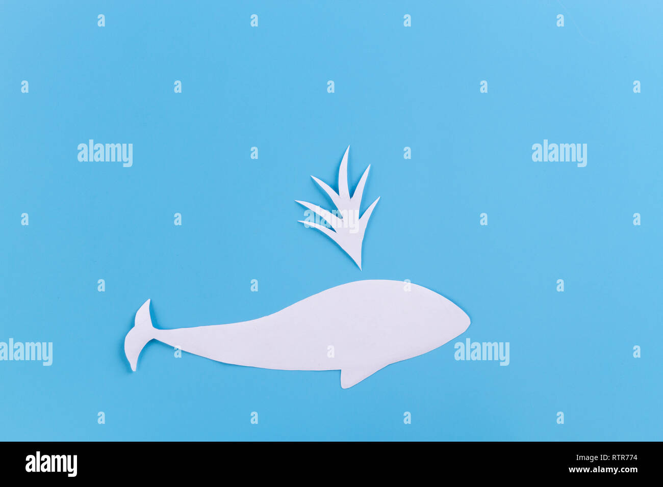 whale in the ocean. paper cut on blue background Stock Photo - Alamy