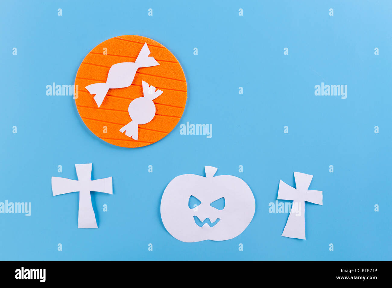 halloween concept image. . graveyard made from paper. blue background ...