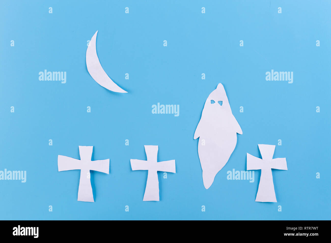 ghost on a graveyard made from paper Stock Photo - Alamy