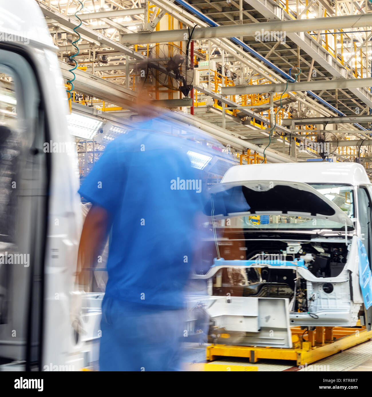 Car production line, skilled workers are working tense Stock Photo - Alamy