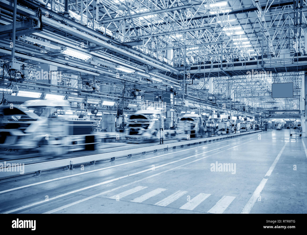 Car production line, skilled workers are working tense Stock Photo - Alamy