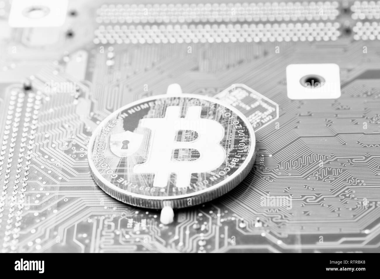 in the motherboard of a computer the coin of bitcoin like concept of ...