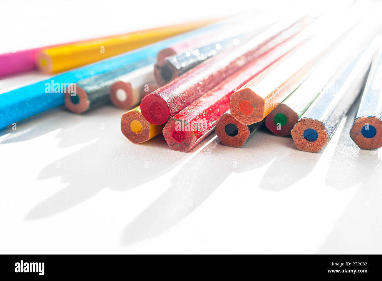 Used Color Pencils Casting Shadows On White Background. Sun Glow ...