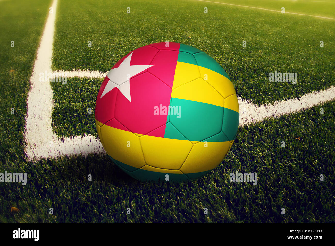 Togo ball on corner kick position, soccer field background. National ...