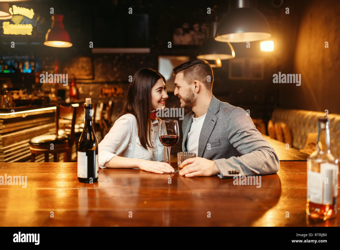 Romantic Evening In Bar Love Couple Kissing At Wooden Counter Lovers