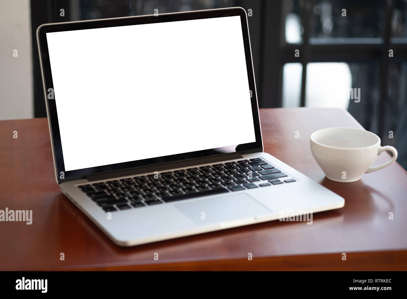 mock up Using laptop with blank screen computer modern Stock Photo - Alamy