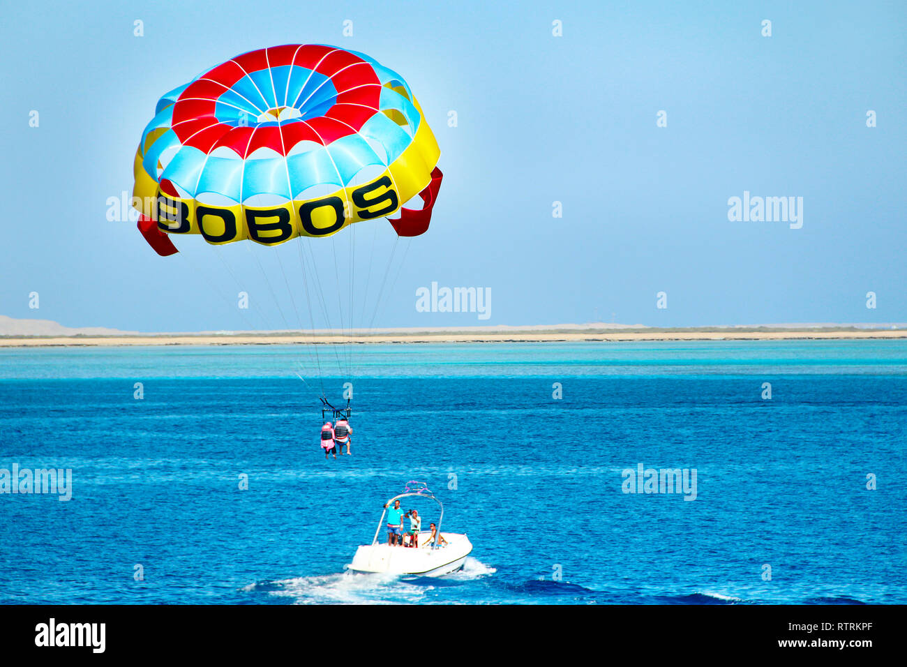 Man is fond of parasailing over Red Sea. Tropical resort in Egypt ...