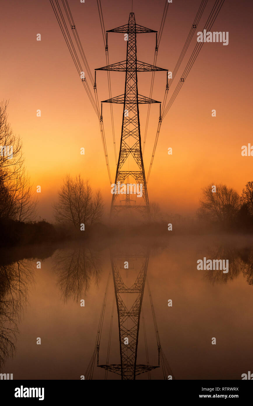 Pylon at sunrise by the River Soar at Zouch, on the Nottinghamshire ...