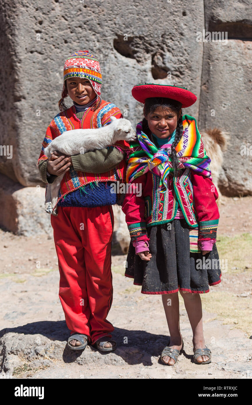 Cusco, Peru, July 2018: Girl and boy native of Cusco, dress their ...