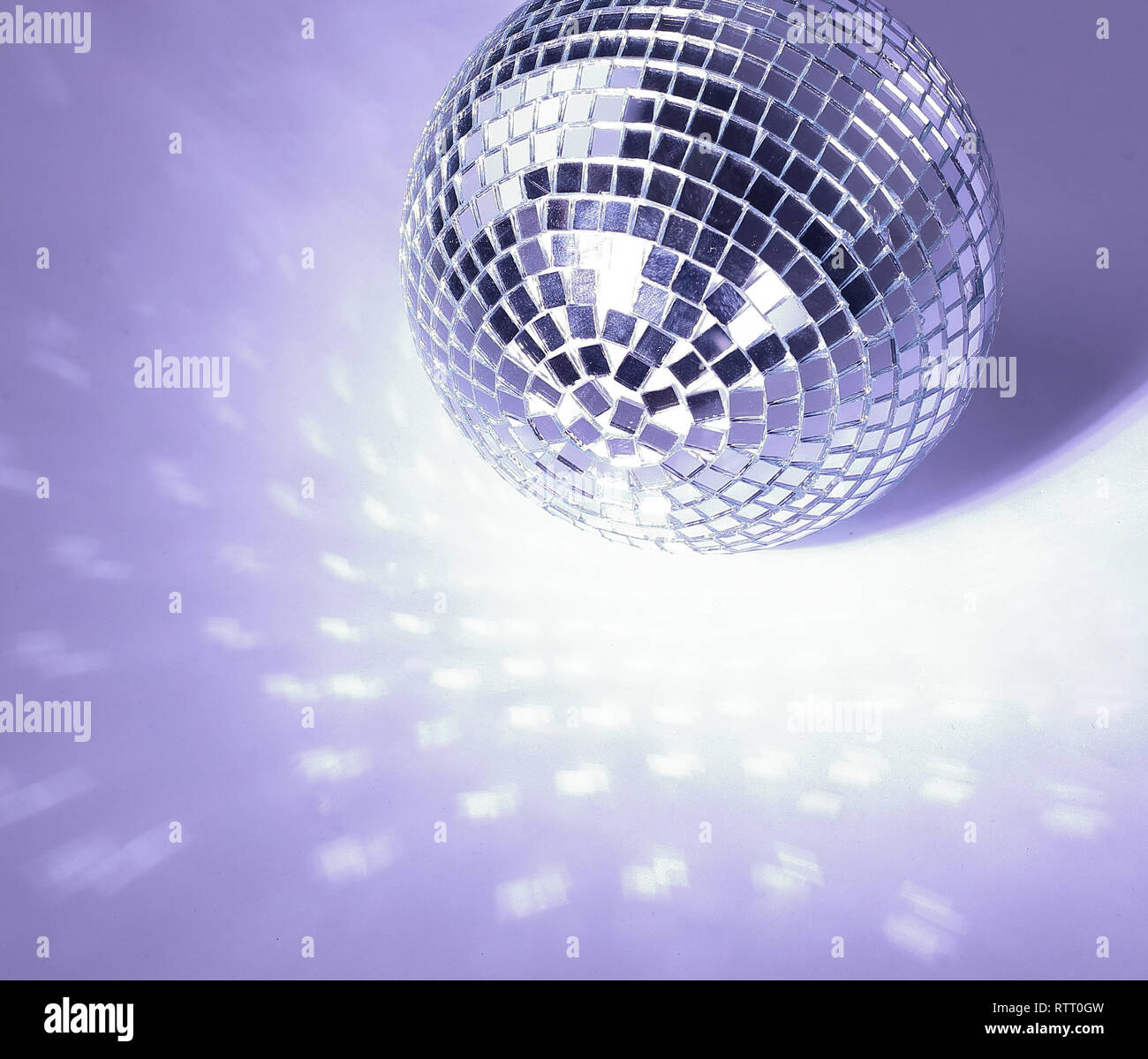 beautiful disco ball on yellow background isolated Stock Photo - Alamy