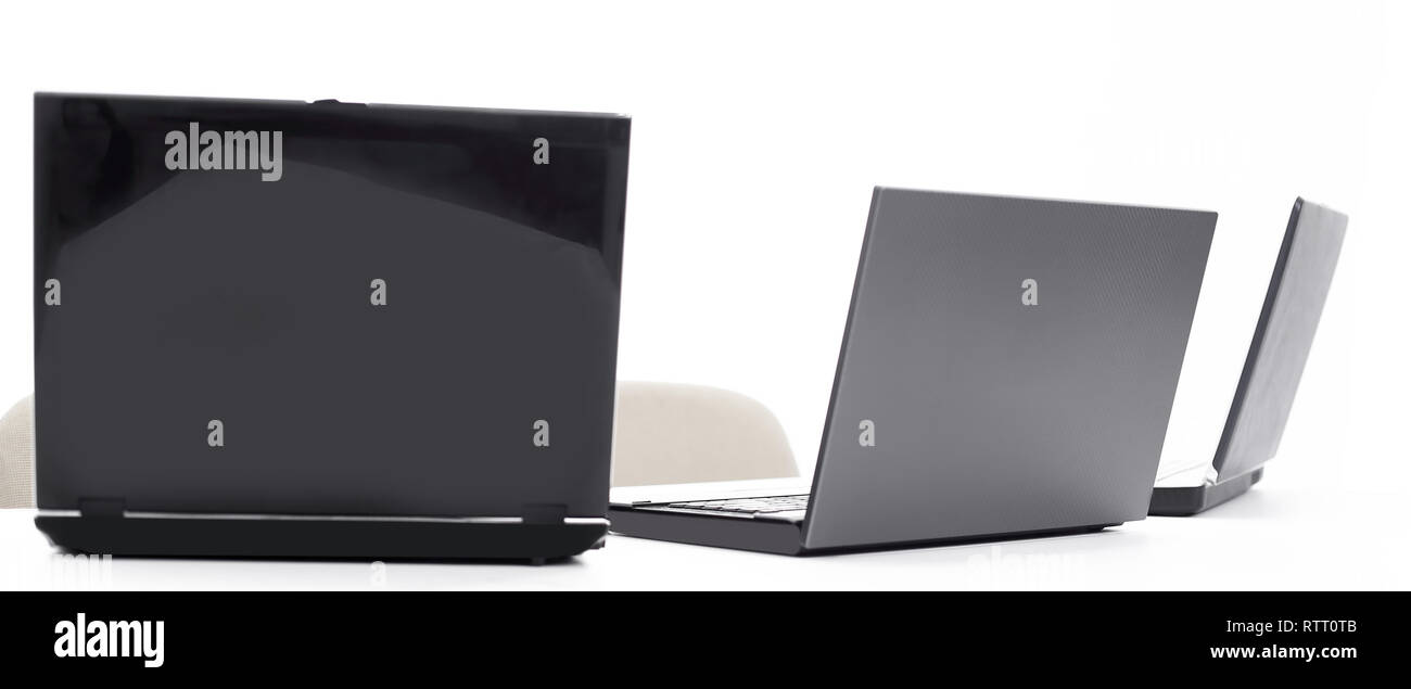 open laptop on the desktop in an empty office Stock Photo - Alamy