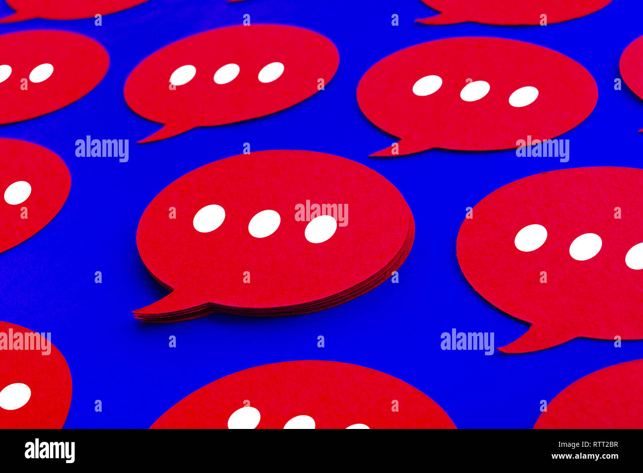 Yellow chat,speech bubble icons on blue color background.Talking and ...