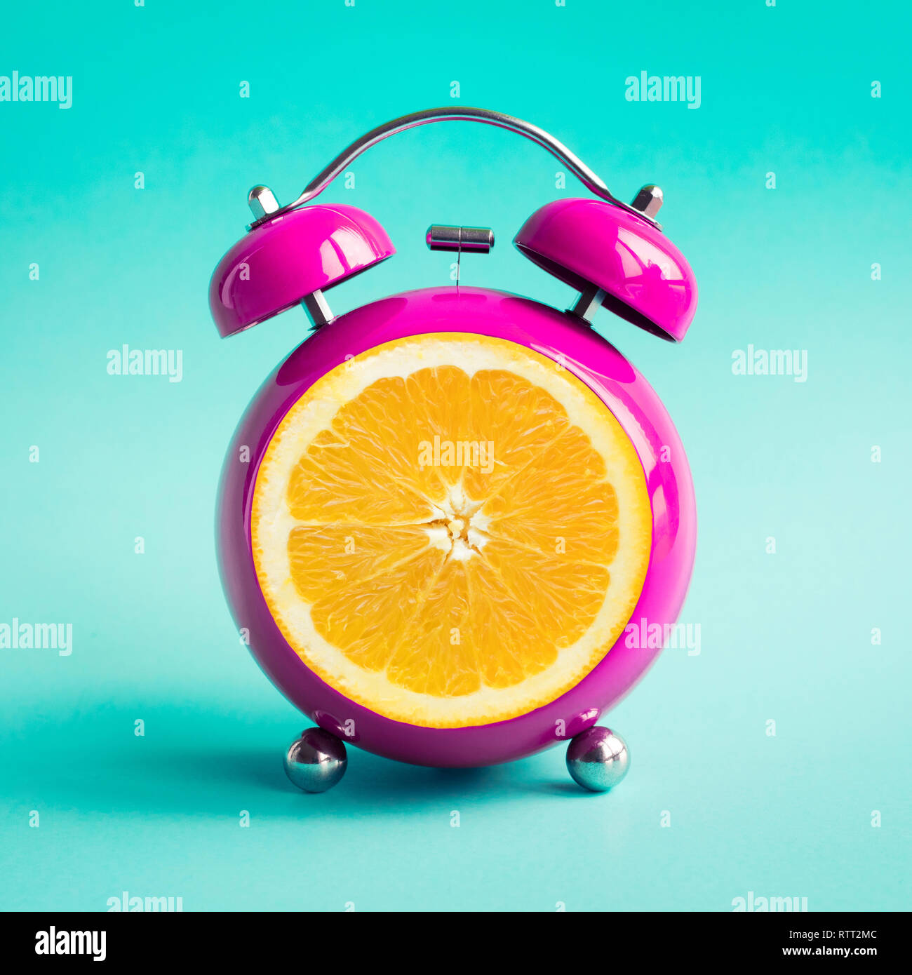 Summer time concepts ideas with orange alarm clock on blue pastel ...