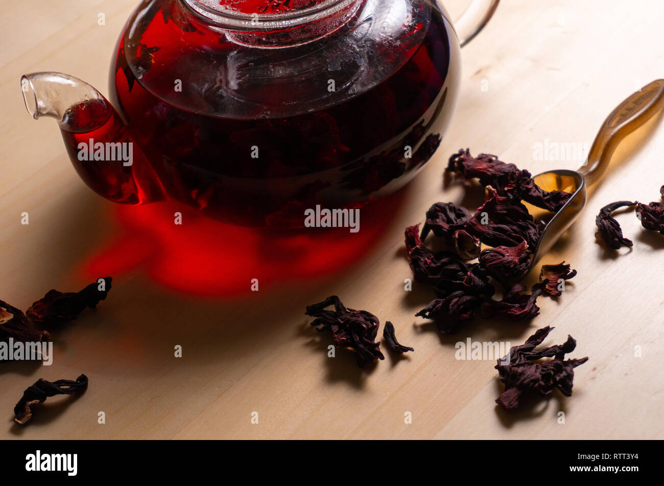 Top view of teapot with red tea. Karkade hibiscus tea Stock Photo - Alamy