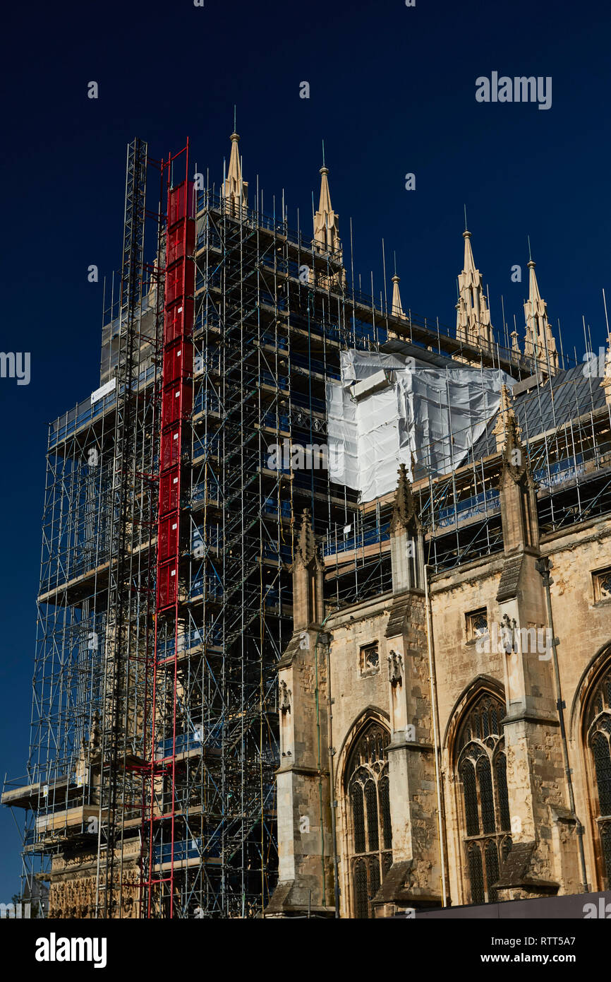 Scaffolding around christian cathedral structure in bright sunshine ...