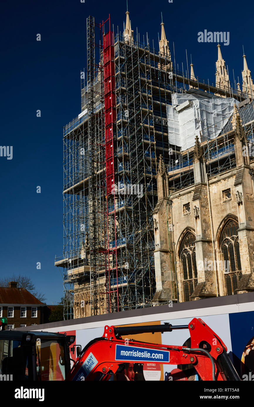 Scaffolding around christian cathedral structure in bright sunshine ...