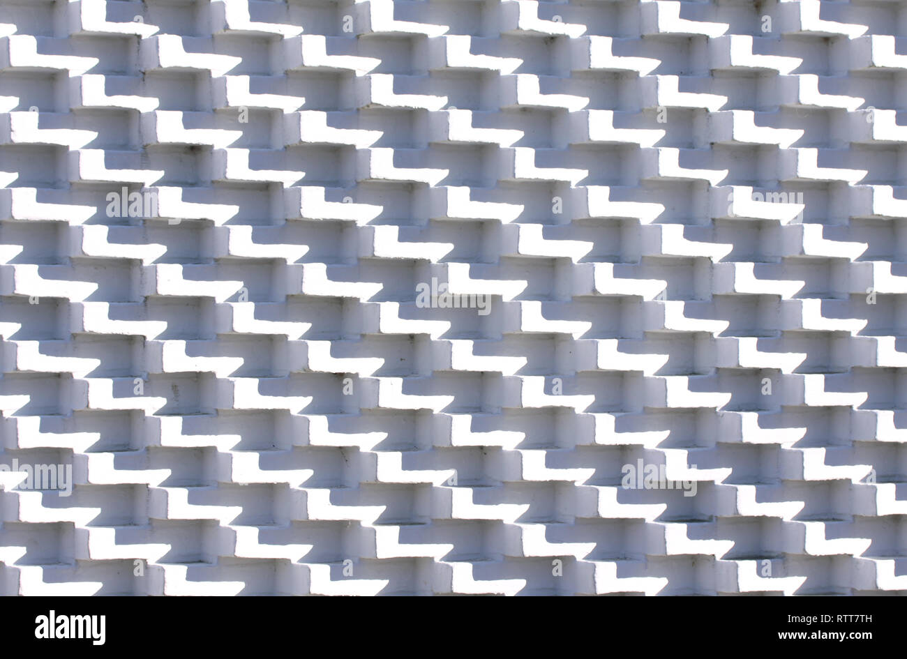 White brick wall in unusual pattern with bricks sticking out Stock ...