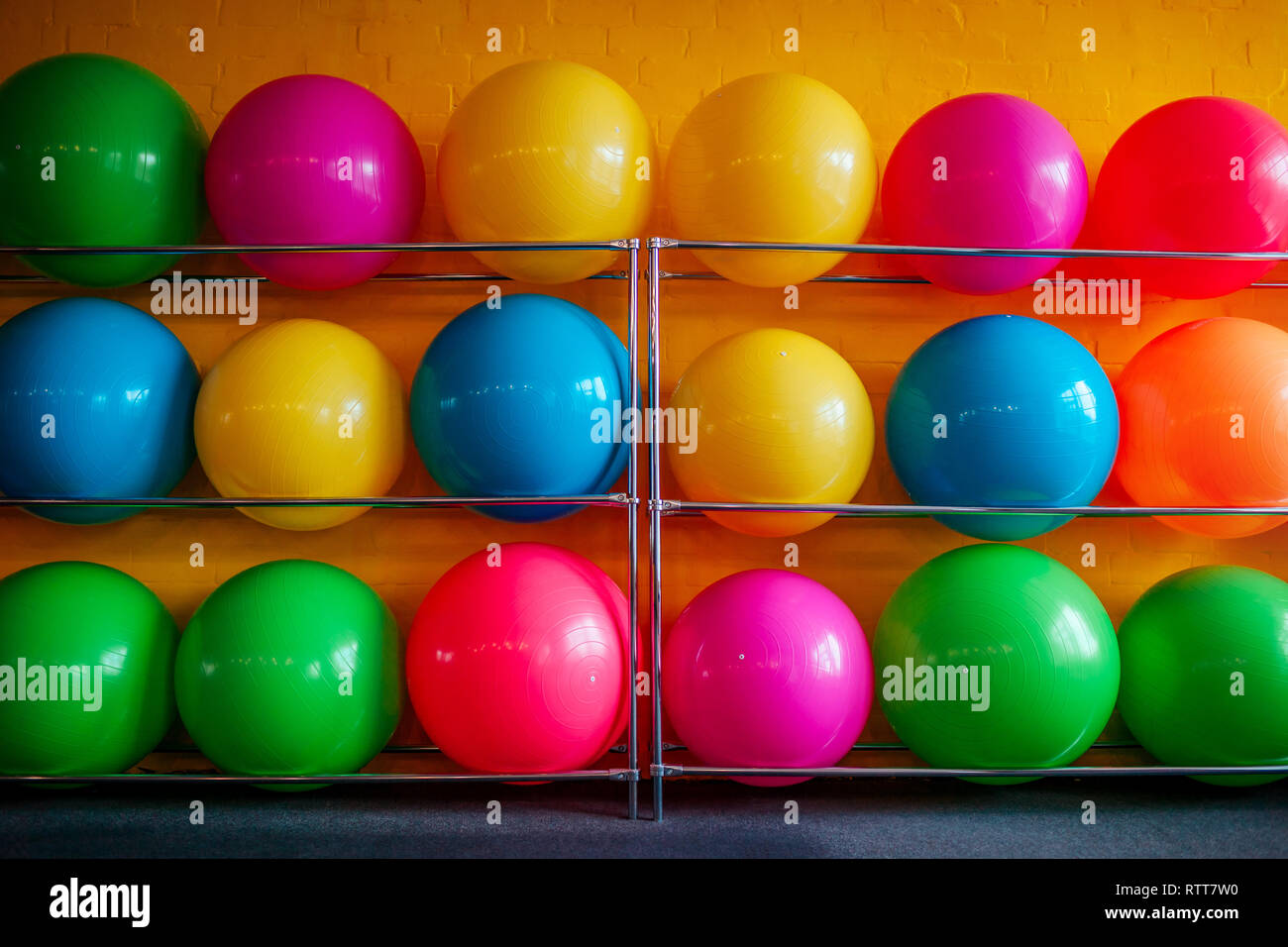 Set of colorful fitness balls at the gym Stock Photo - Alamy