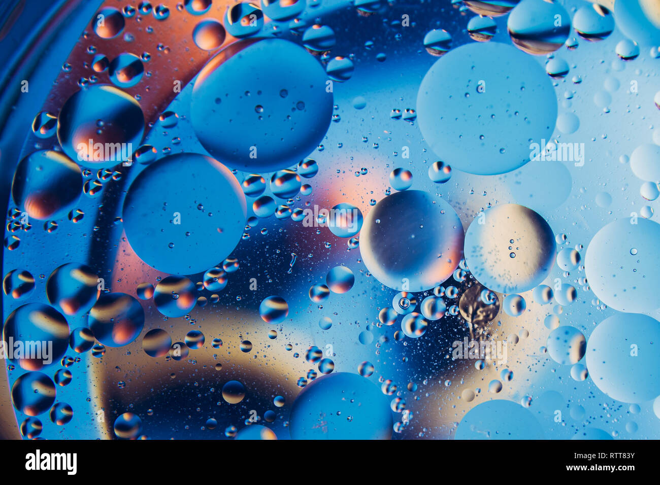 Beautiful abstract space background. Water drops of different colours ...