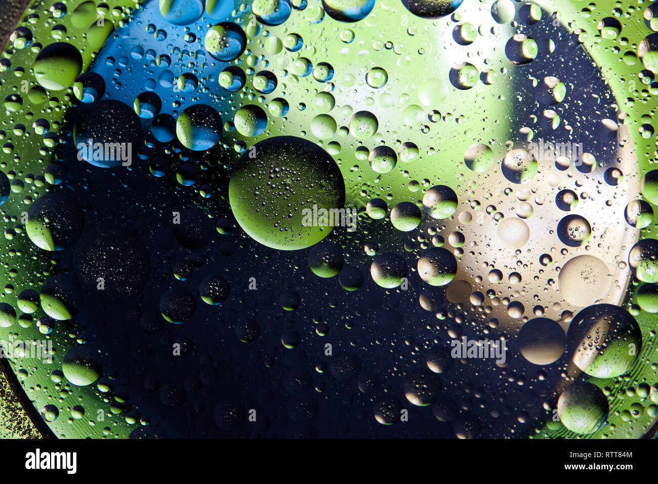 Beautiful abstract space background. Water drops of different colours ...