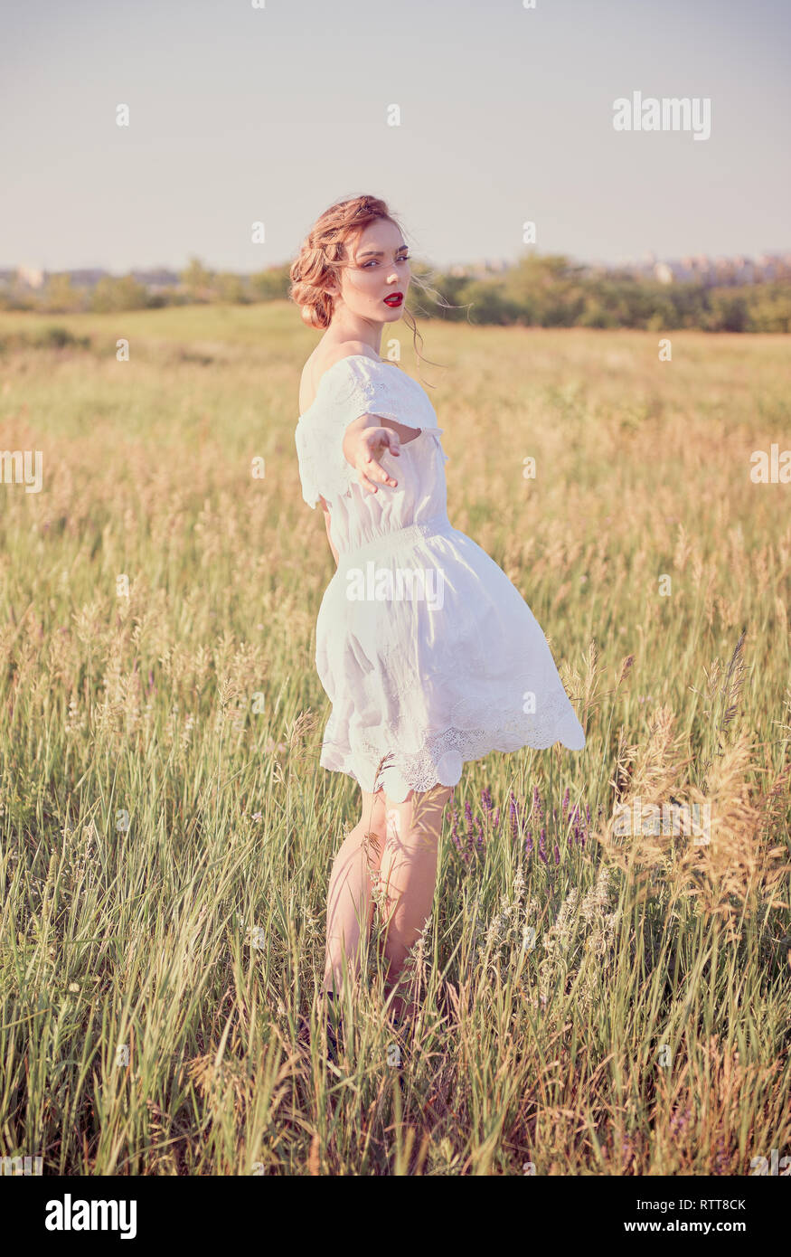 Beautiful young woman is saying goodbye and leaving. Portrait in a ...