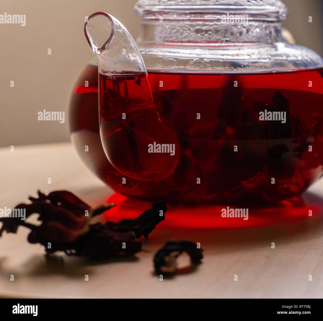 Closeup view of teapot with red tea. Hibiscus karkade red tea Stock ...