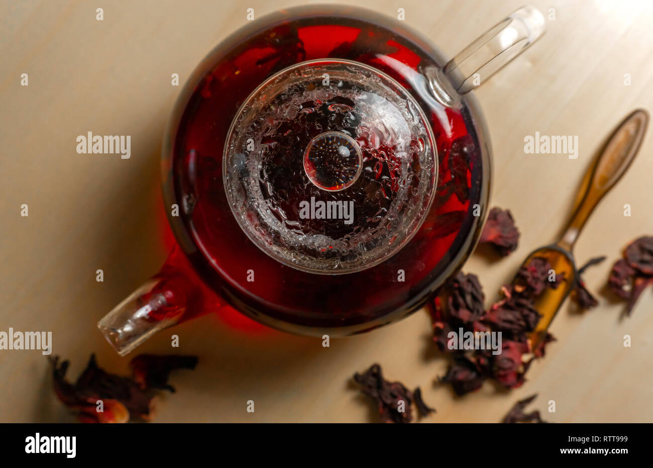 Top view on hibiscus egyptian karkade red tea in teapot Stock Photo - Alamy