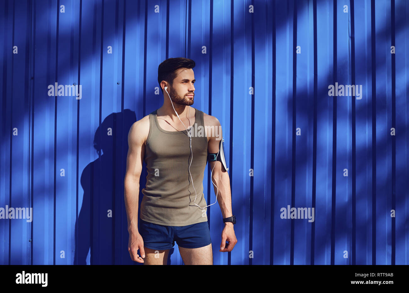 Happy young man wall beard hi-res stock photography and images - Alamy