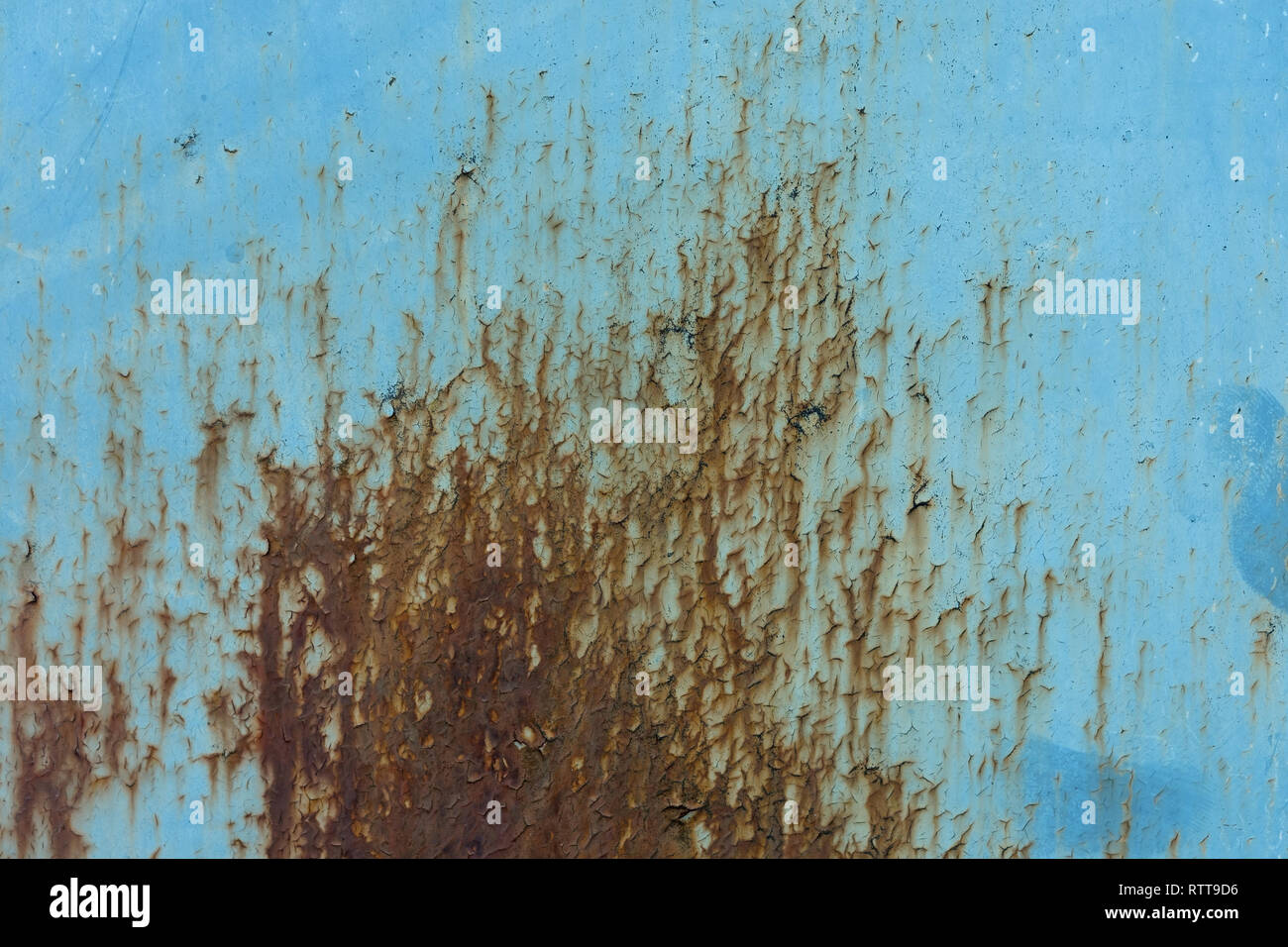 Light blue wall with scaly rust as background Stock Photo - Alamy