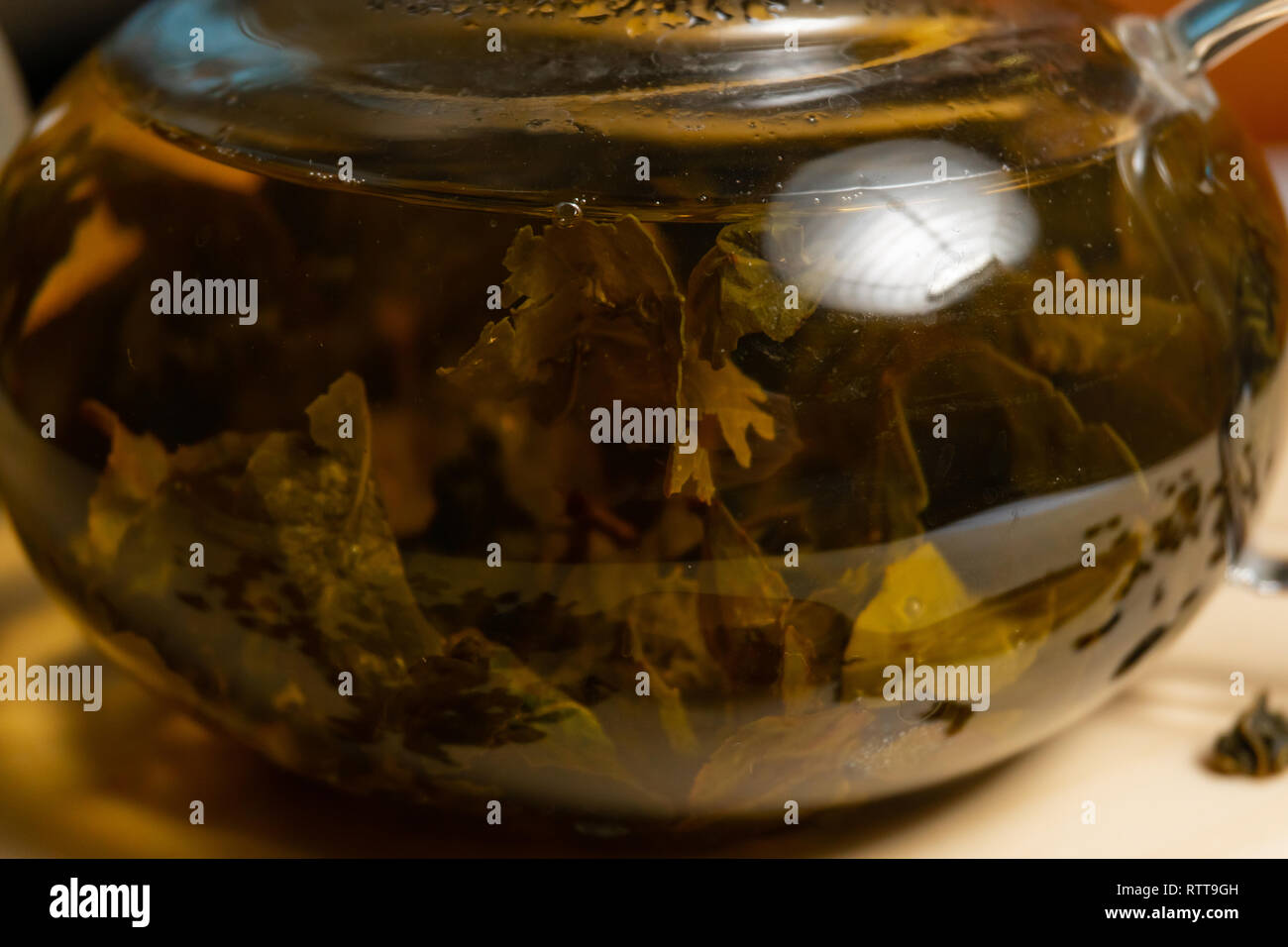 Closeup view of brewed green chinese tea in teapot. Hot beverage Stock ...