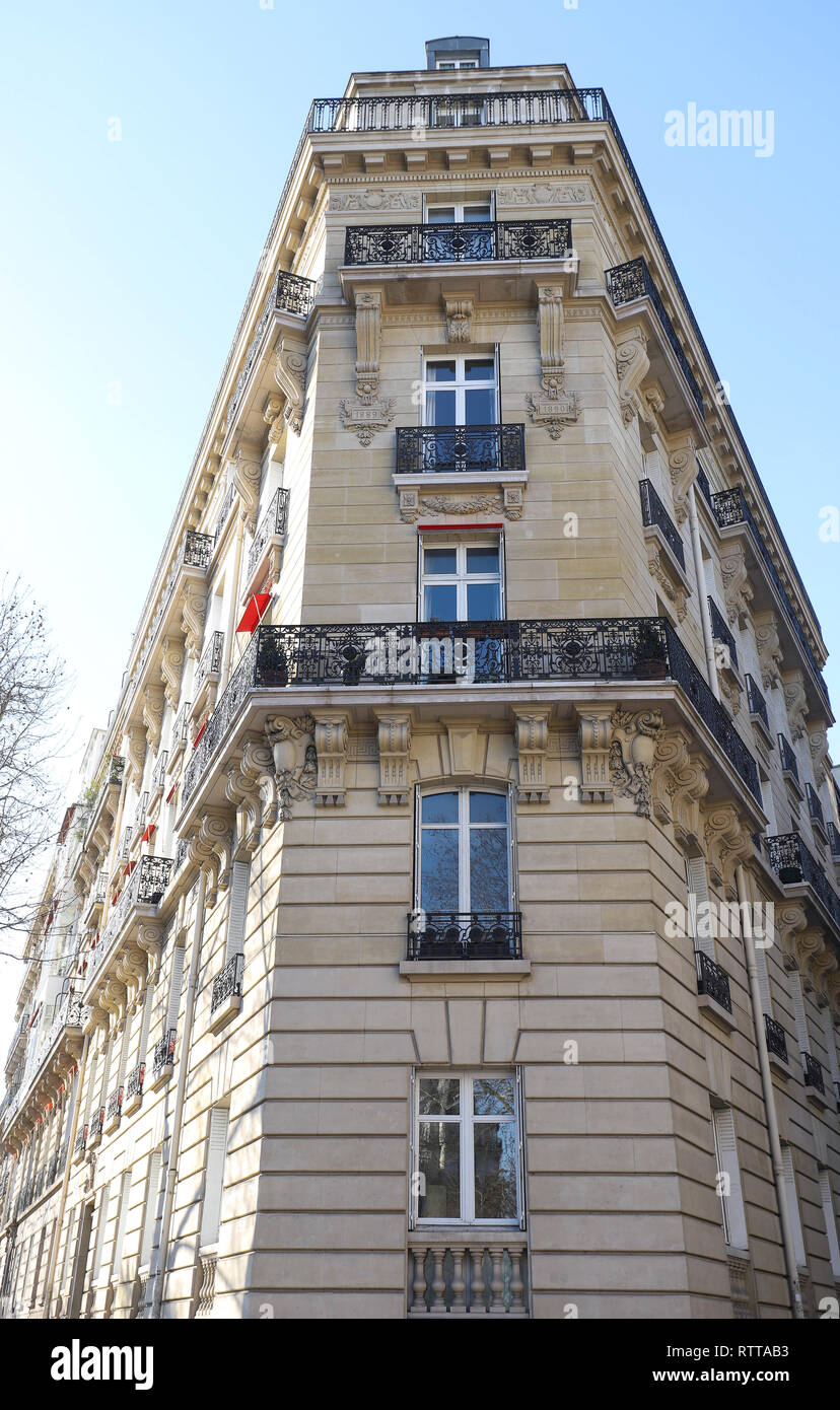 Traditional French house with typical balconies and windows. Paris ...