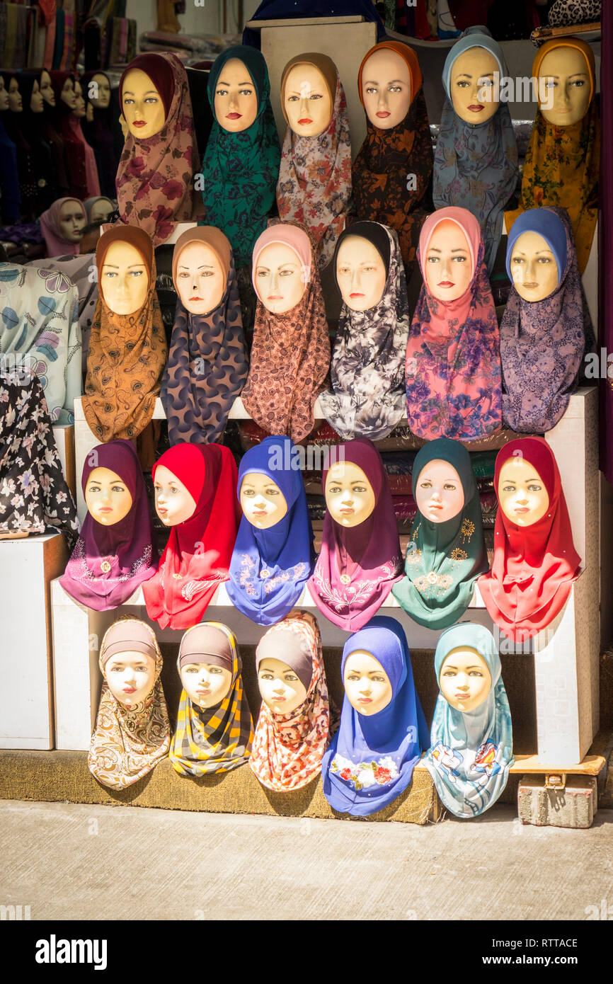display of traditional hijab headscarves outside store in Little India ...