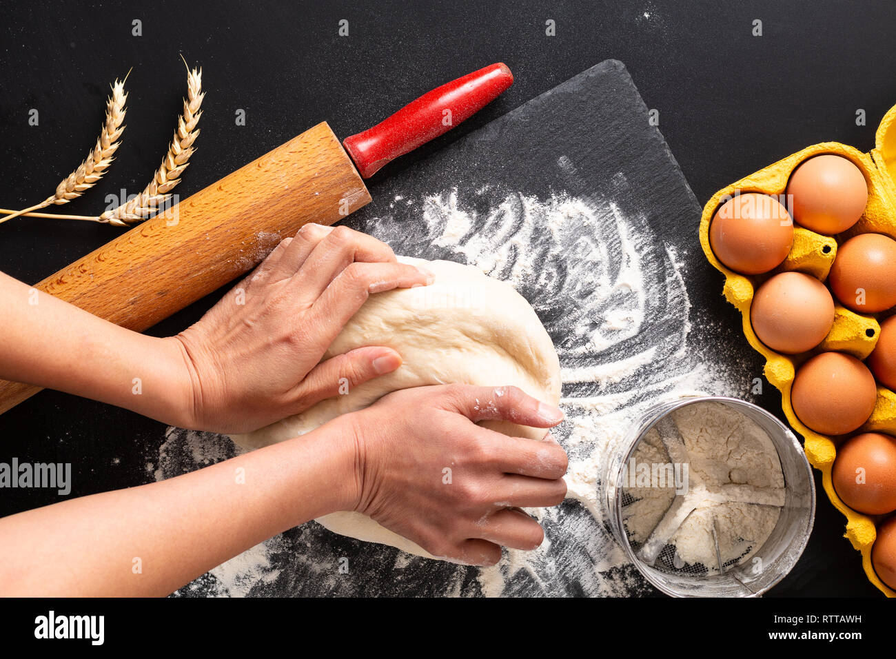 Food preparation concept over head shot Kneading dough for bakery ...