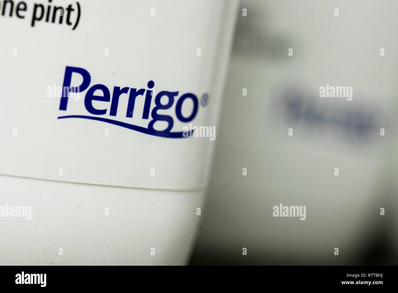 A Perrigo Company logo is seen on prescription pharmaceutical packaging ...