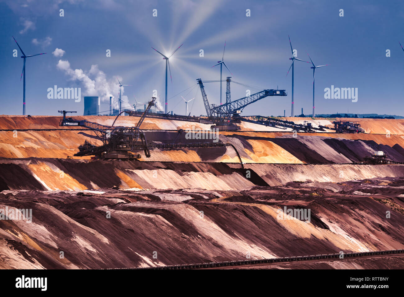 GARZWEILER, GERMANY - SEPTEMBER 01, 2016: Huge machines refill the ...