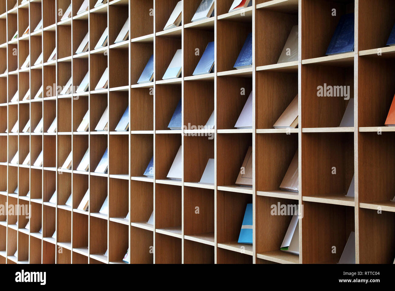 Makeup Of Regular Grid Of Bookshelf In Public Library Stock Photo - Alamy