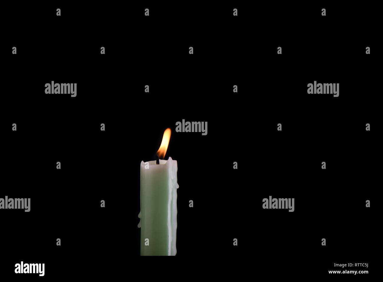 Single candle burning green hi-res stock photography and images - Alamy