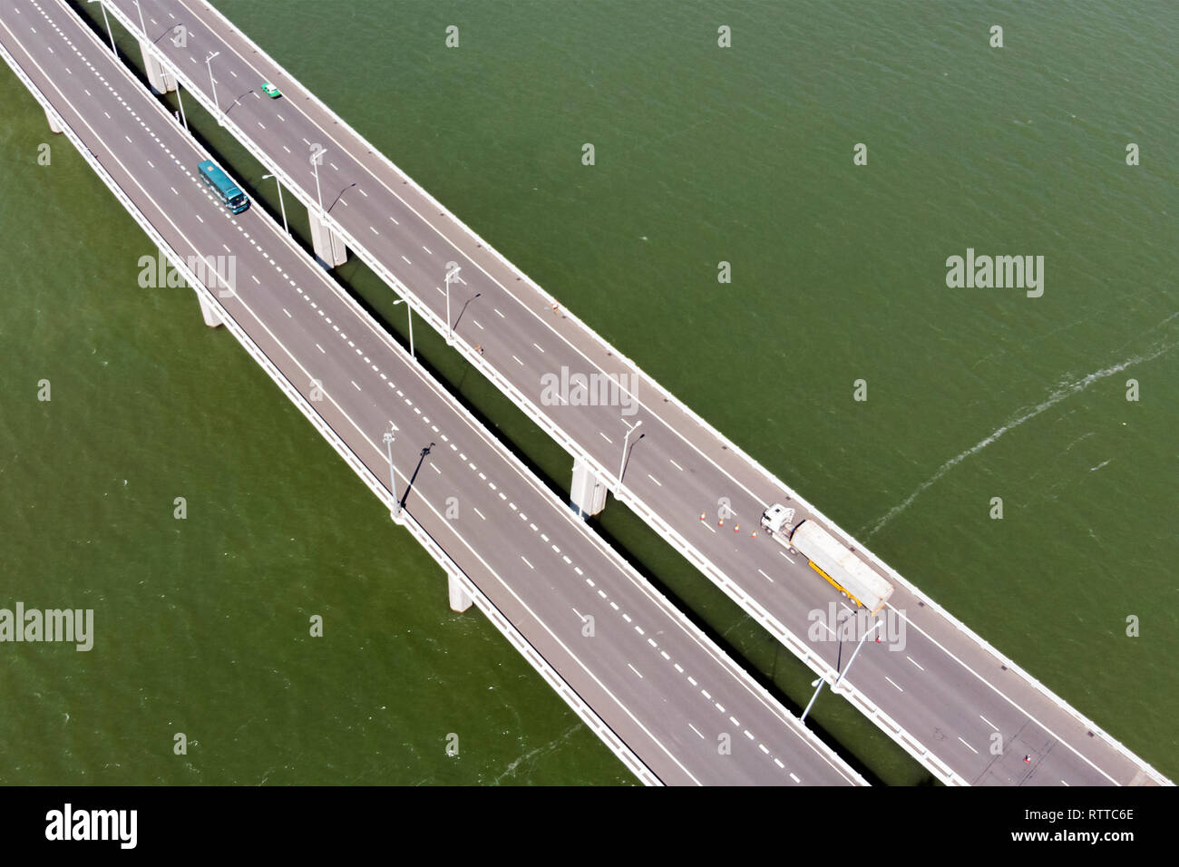 Aerial View of Bridge Over The Reservoir and Vehicles. Shenzhen, China ...