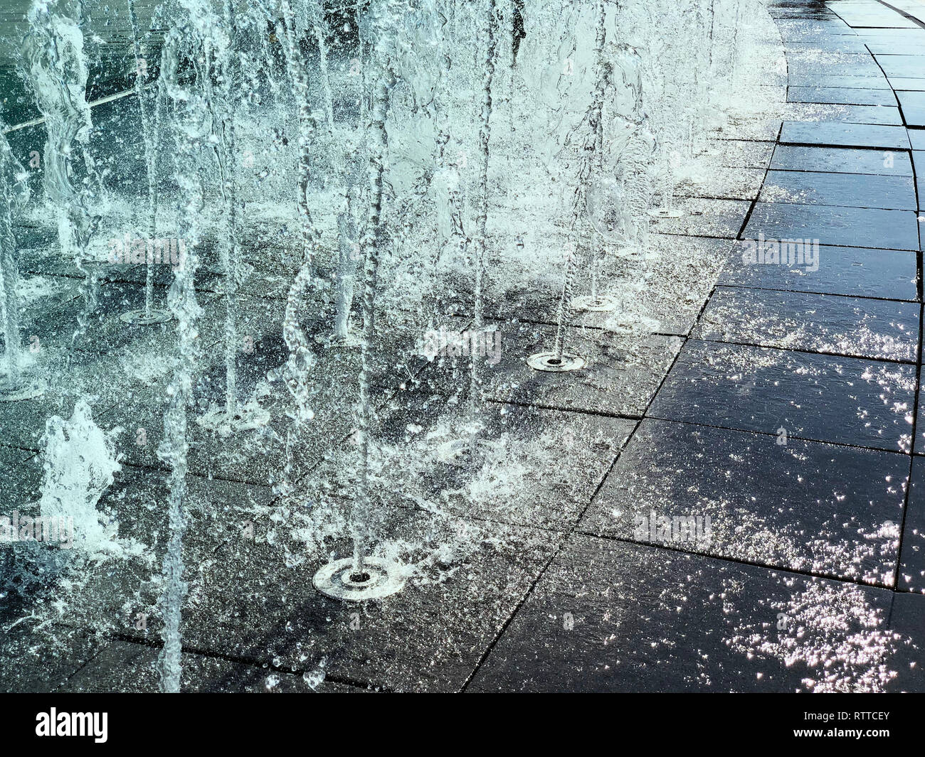 Dry Fountain Splashes Fresh Water On Hot Sunny Day Stock Photo - Alamy