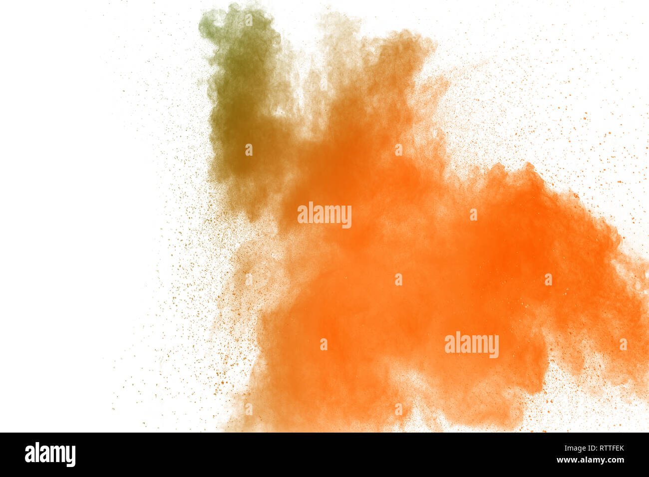 Abstract yellow orange powder explosion on white background. Freeze ...