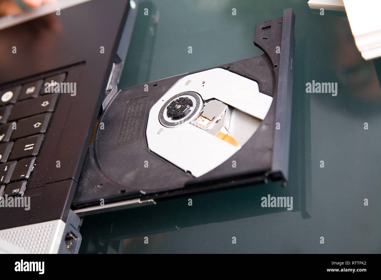 modern notebook's opened cd bay without cd Stock Photo - Alamy