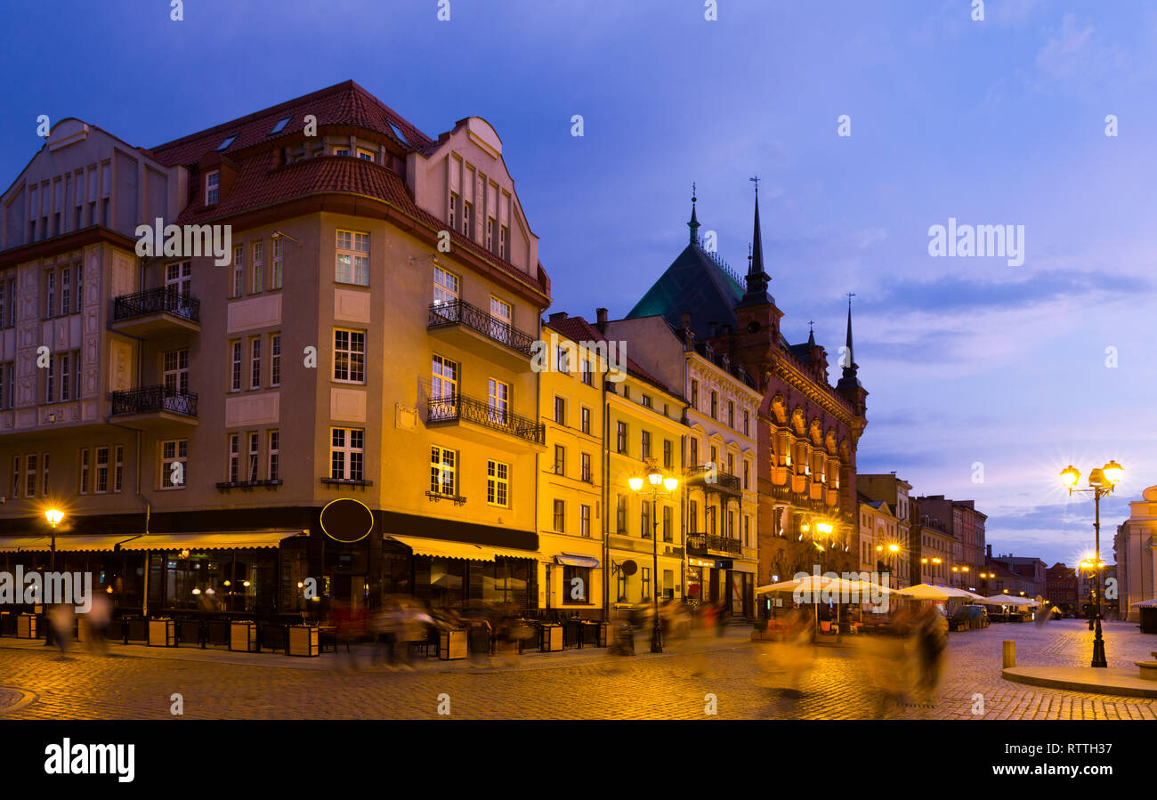 Nightlife of lighted Torun streets in warm spring, Poland Stock Photo ...