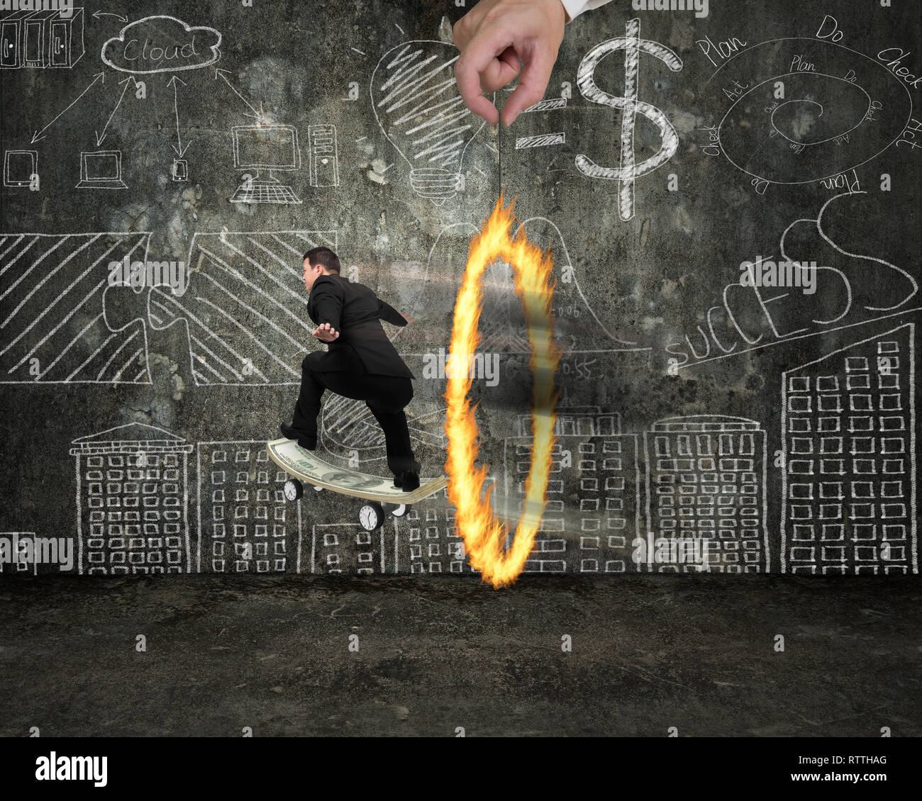 Businessman skating on money skateboard through fire circle with ...