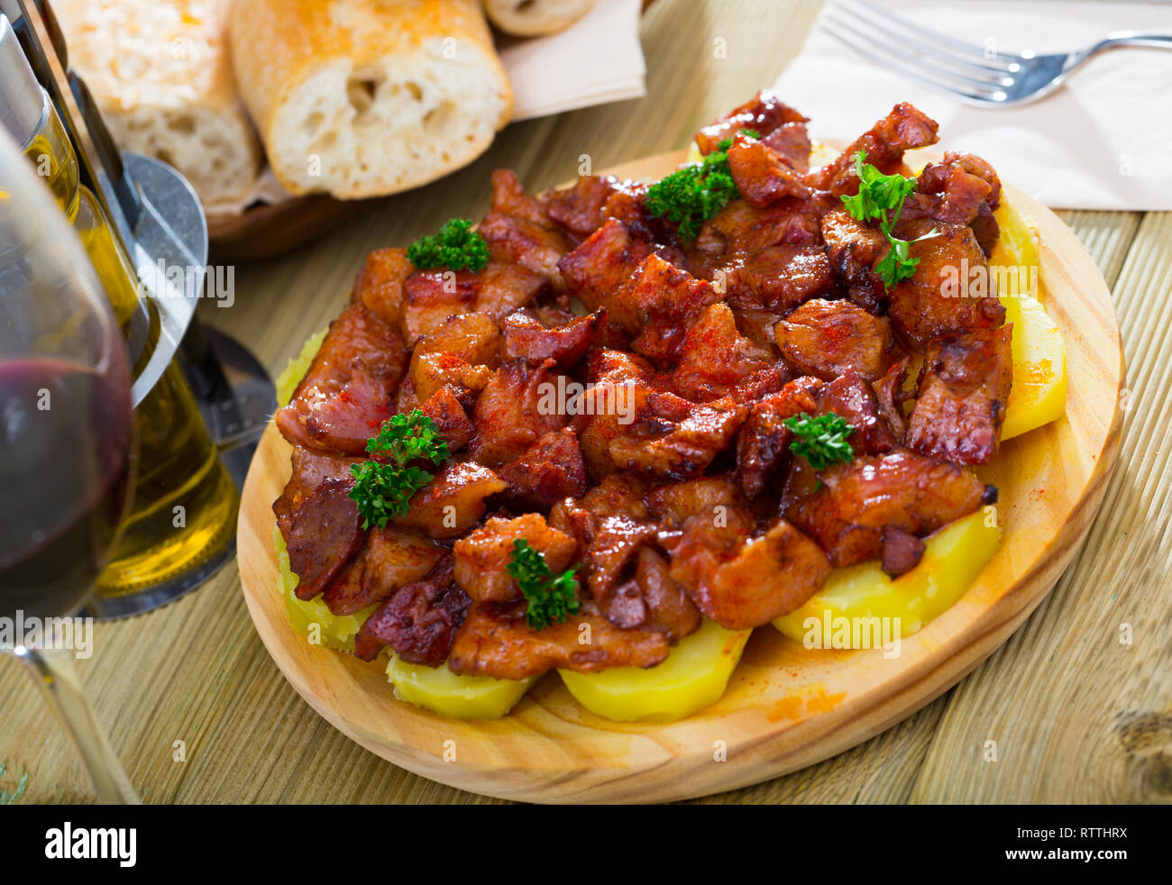 Spanish dish - roasted pig nose and cheeks Stock Photo - Alamy