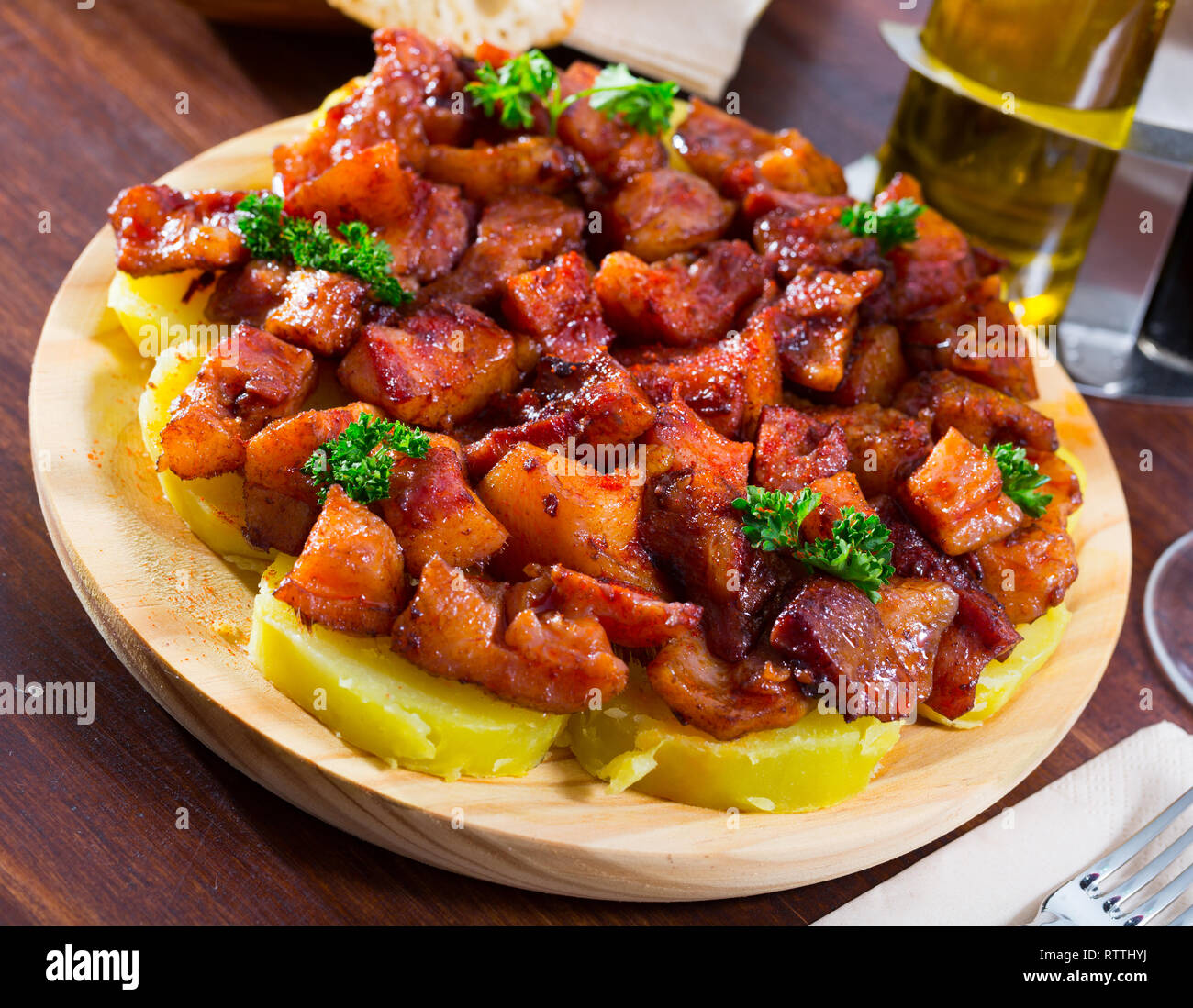 Morro de cerdo a la gallega - spanish dish. Roast nose and cheek pigs ...
